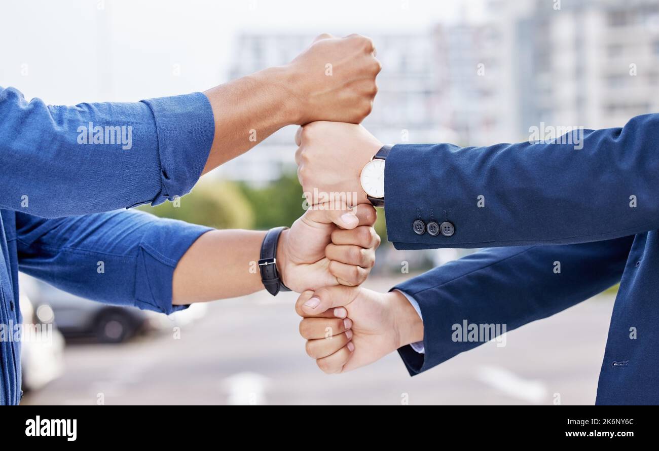 No letting go, no holding back. two unrecognizable businesspeople ...