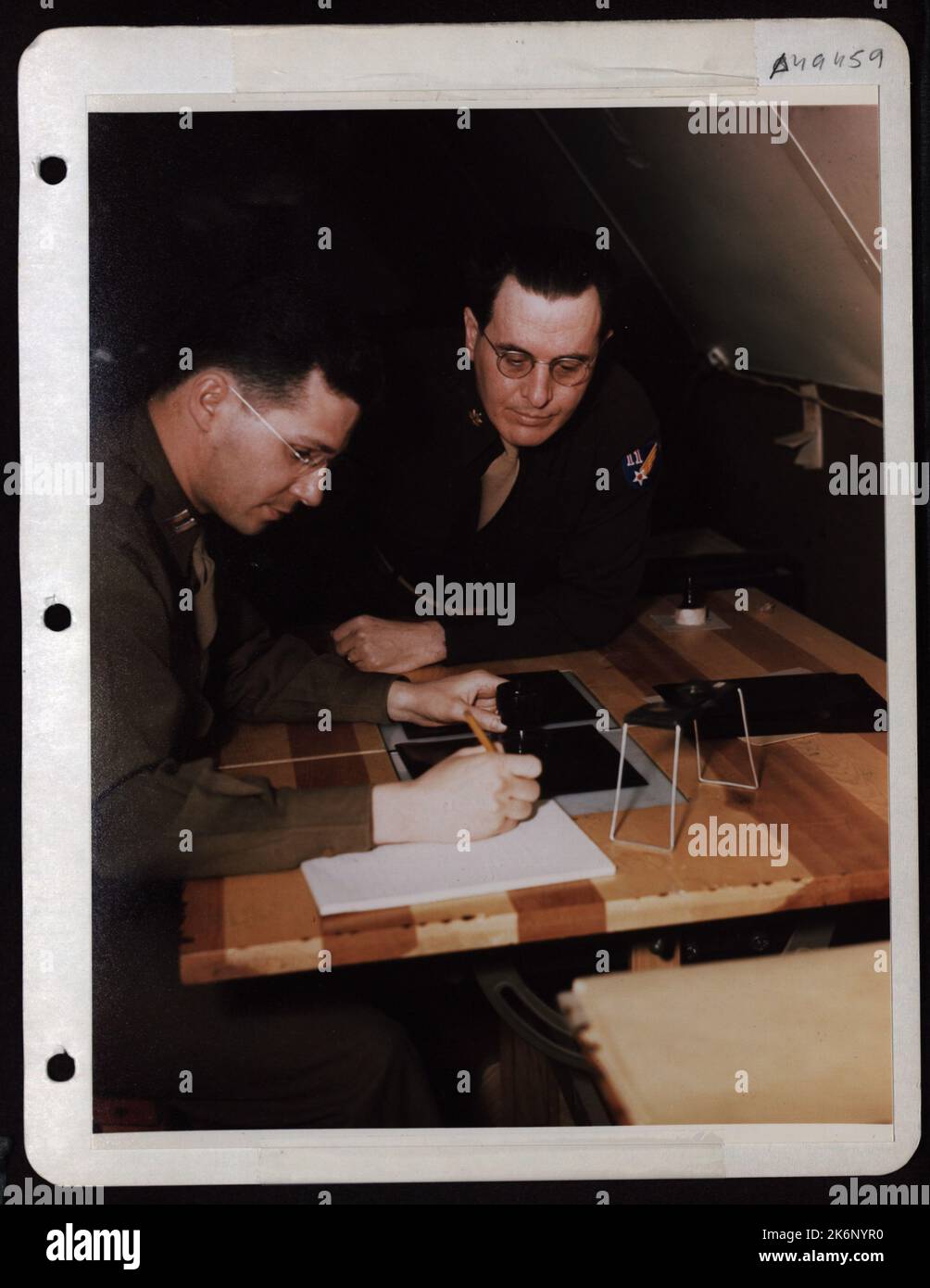 Capt. John Noll Makes Notes From Natural Colored Photographs Of The ...