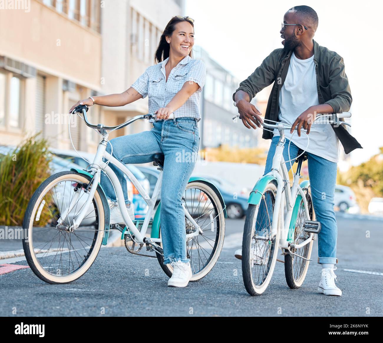 Couple in street, bicycle and eco friendly travel, happy and clean ...