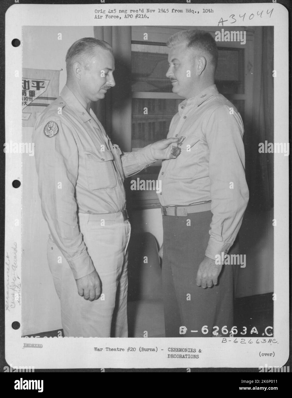Brig. General Aubry L. Moore presents Air Medal to Col. John A. McCann ...