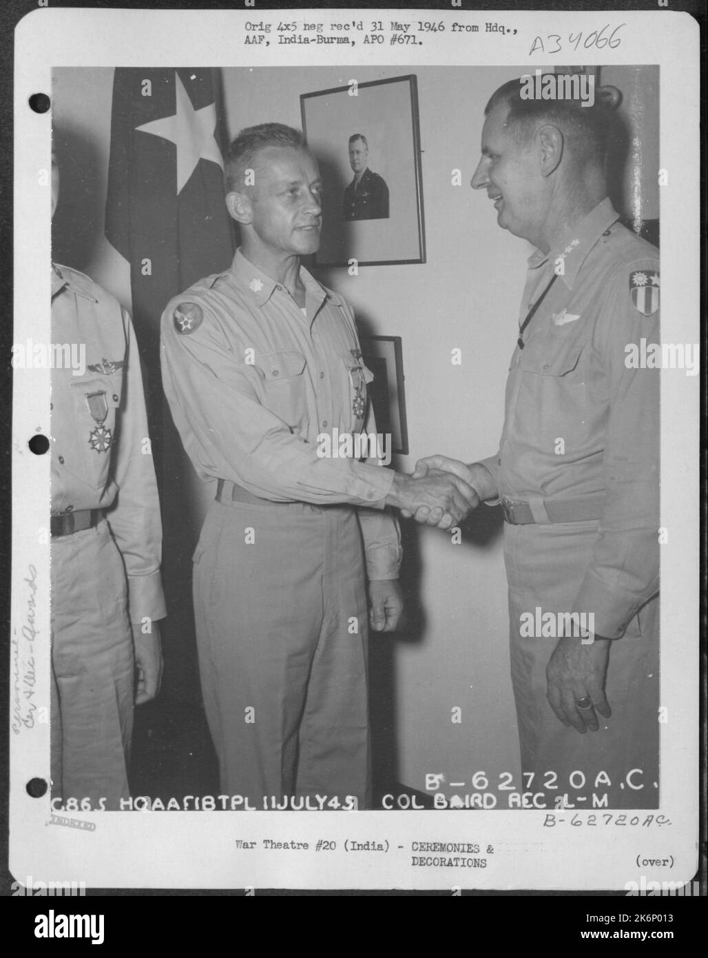 Lt. General George E. Stratemeyer congratulates Lt. Col. Baird after ...