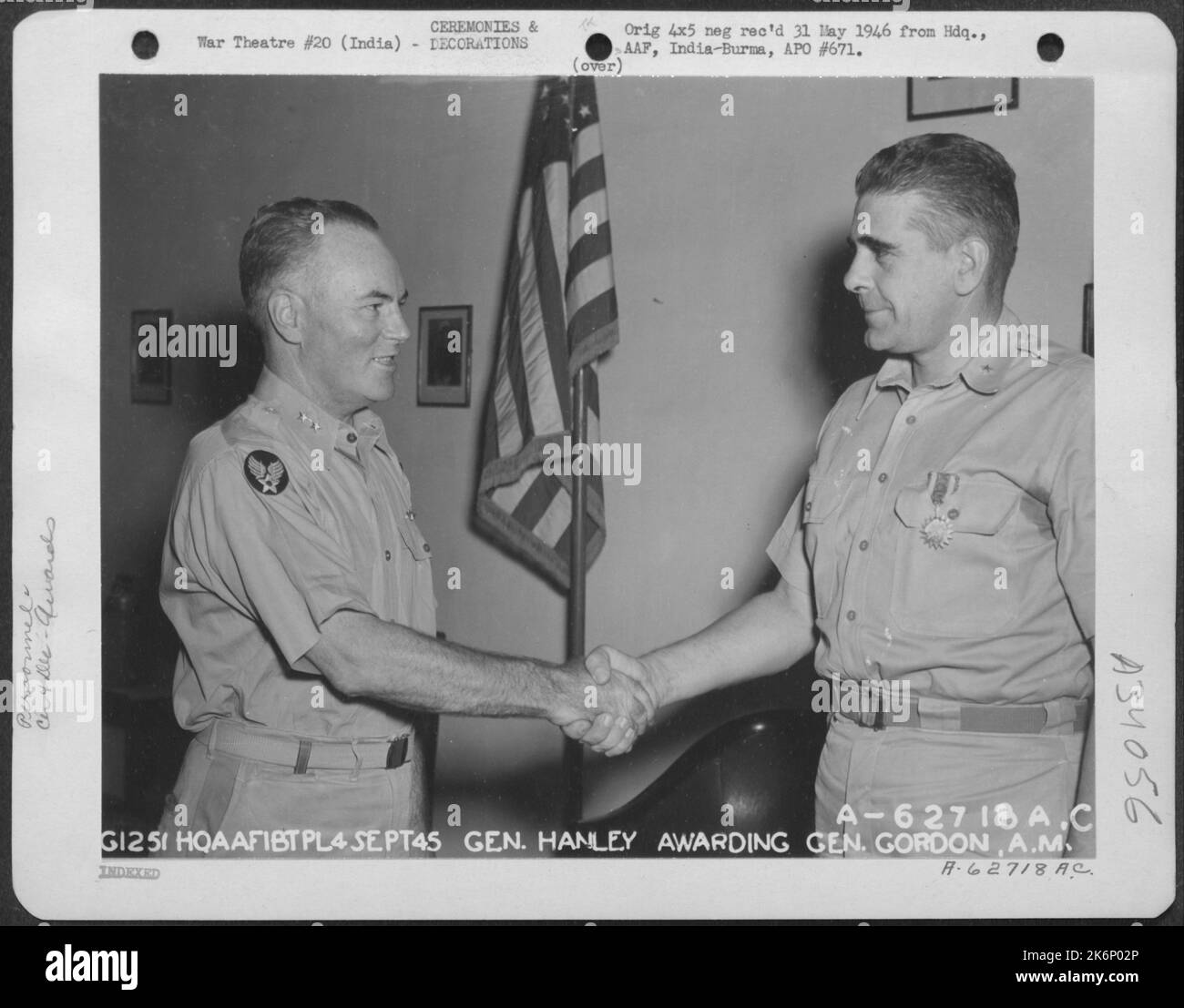 Major General Thomas J. Hanley, Jr., congratulates Brig. General John C ...