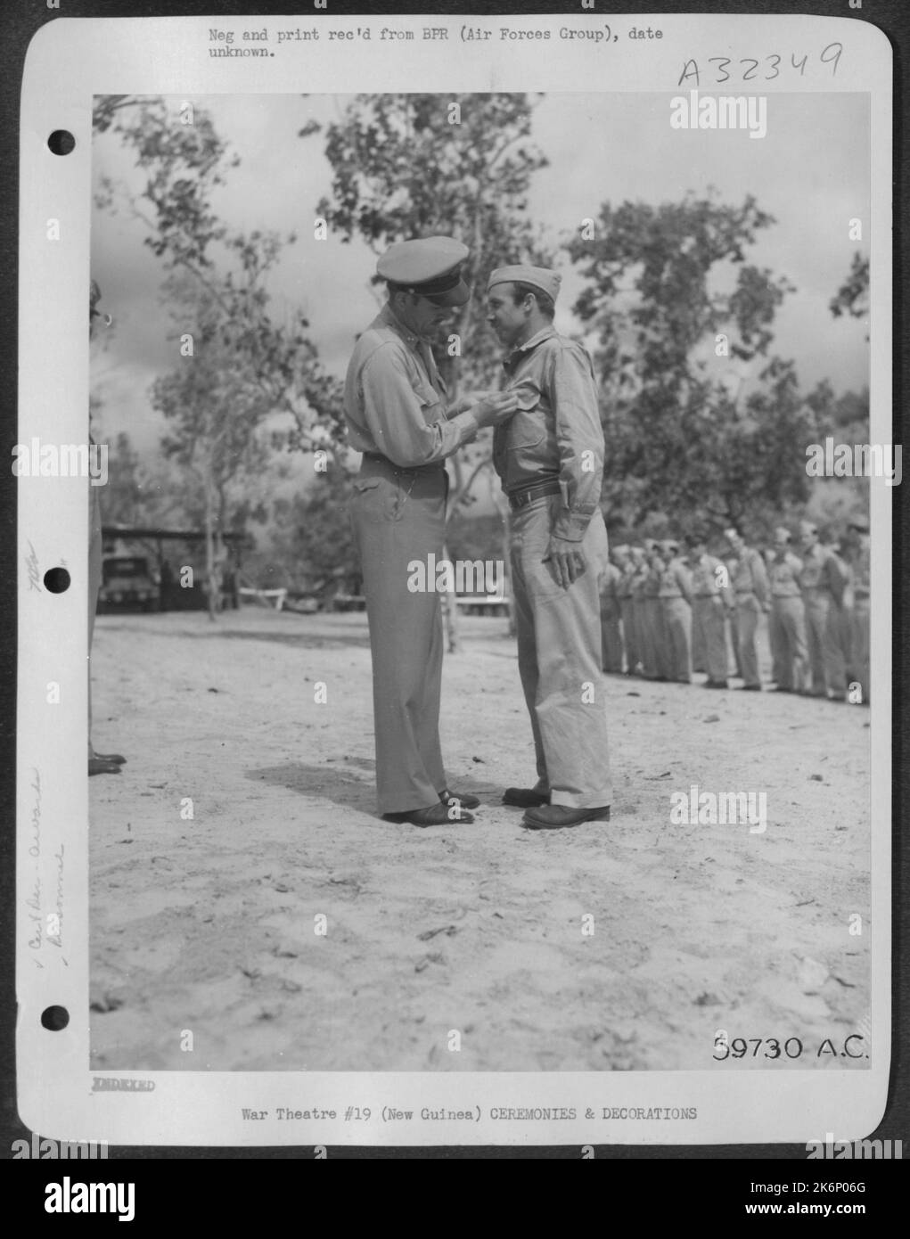 At a ceremony in New Guinea, 15 September 1943, the Distinguished ...