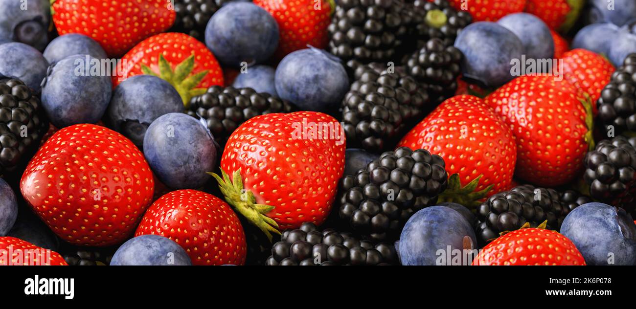 different berries and fruits strawberries, blueberries and blackberries ...