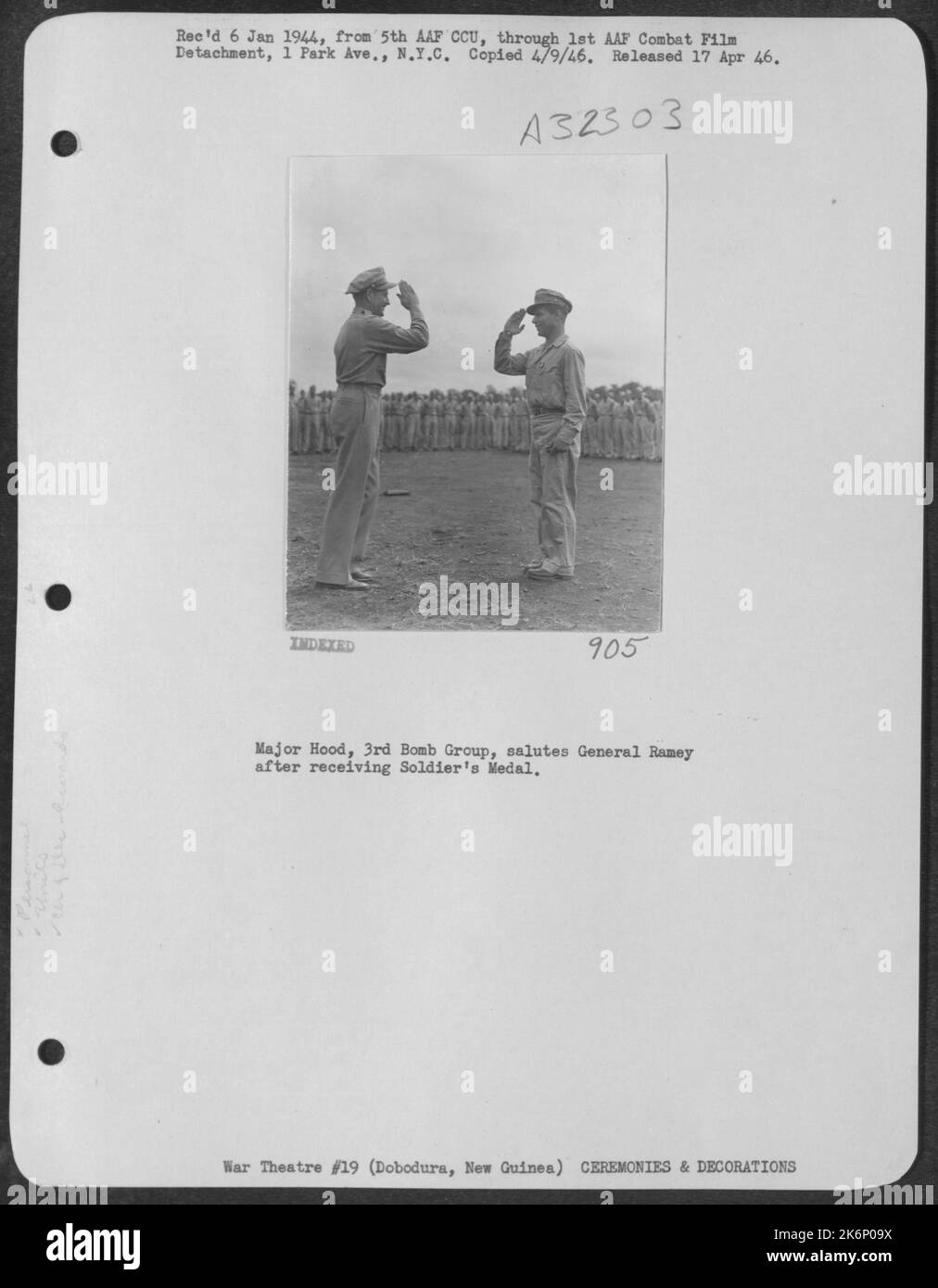 Major Hood, 3rd Bomb Group, salutes General Ramey after receiving ...