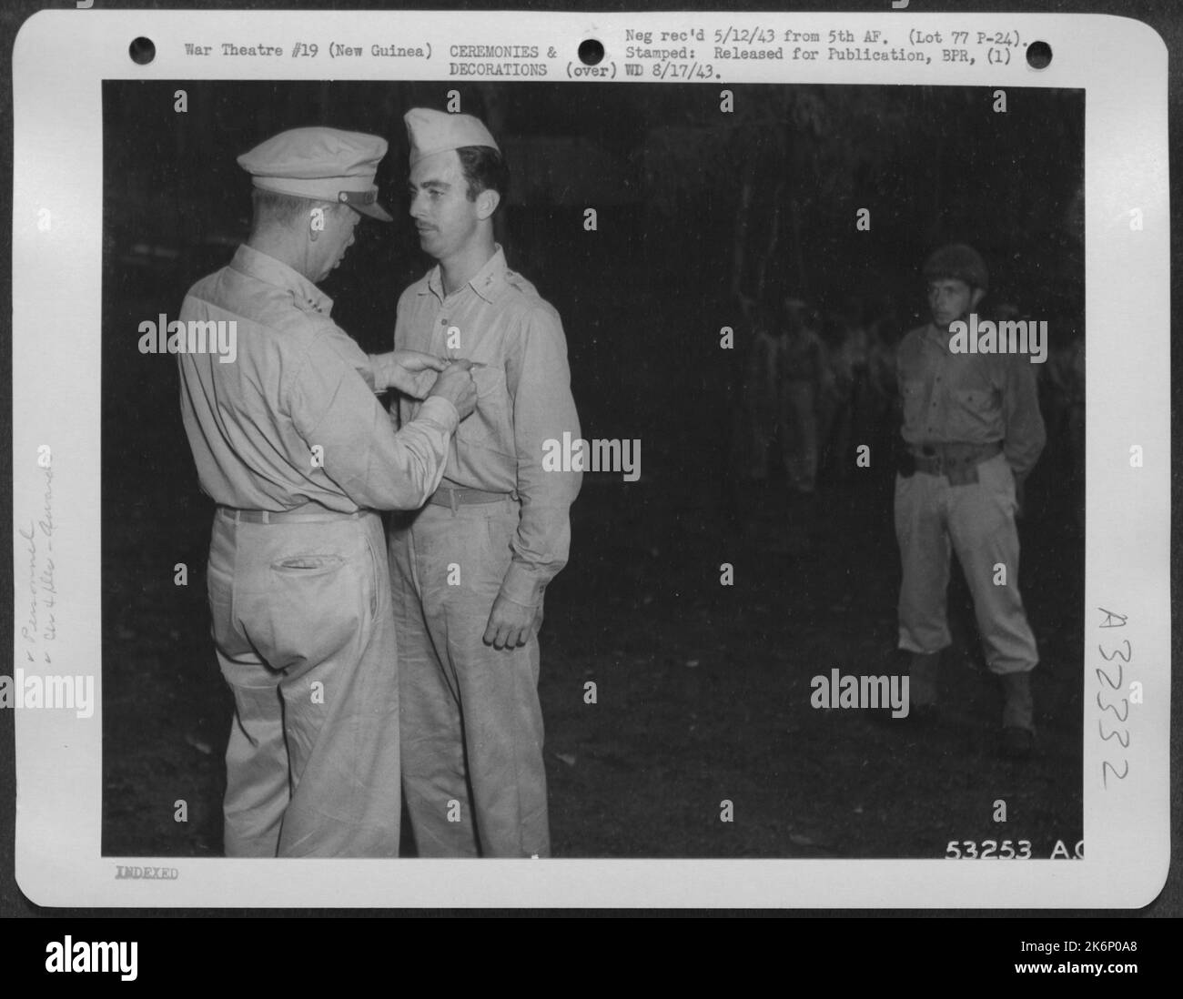Capt. William A. Brown, of Mancelona, Mich., is pictured receiving the ...