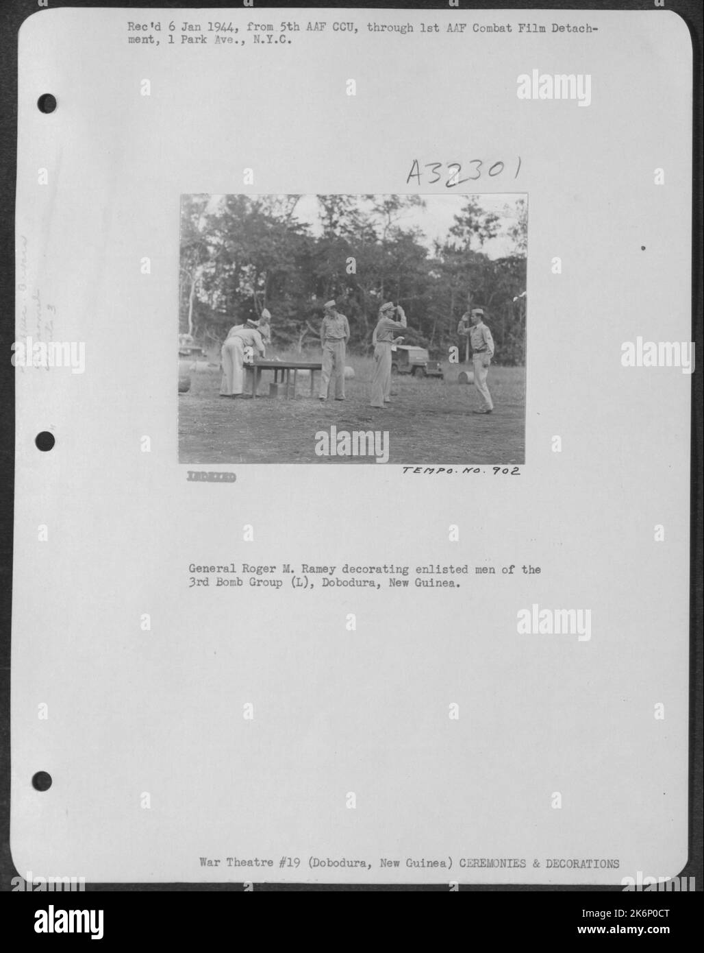 General Roger M. Ramey decorating enlisted men of the 3rd Bomb Group (L ...