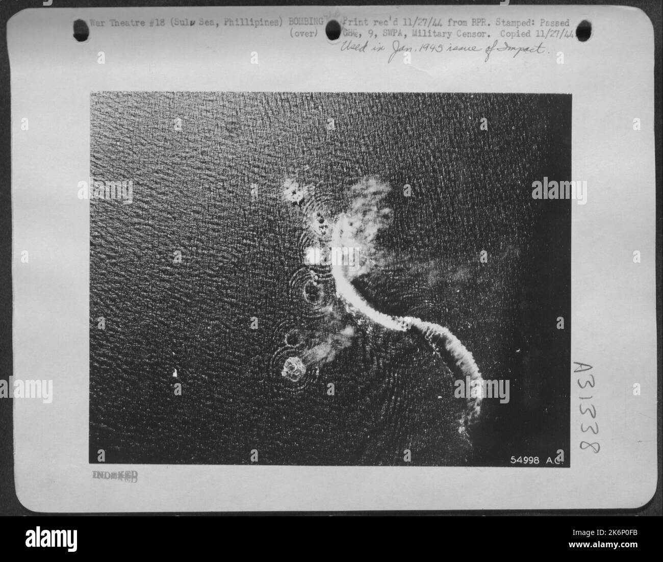 Photograph shows the Kongo class battleship, boxed in by thousand ...