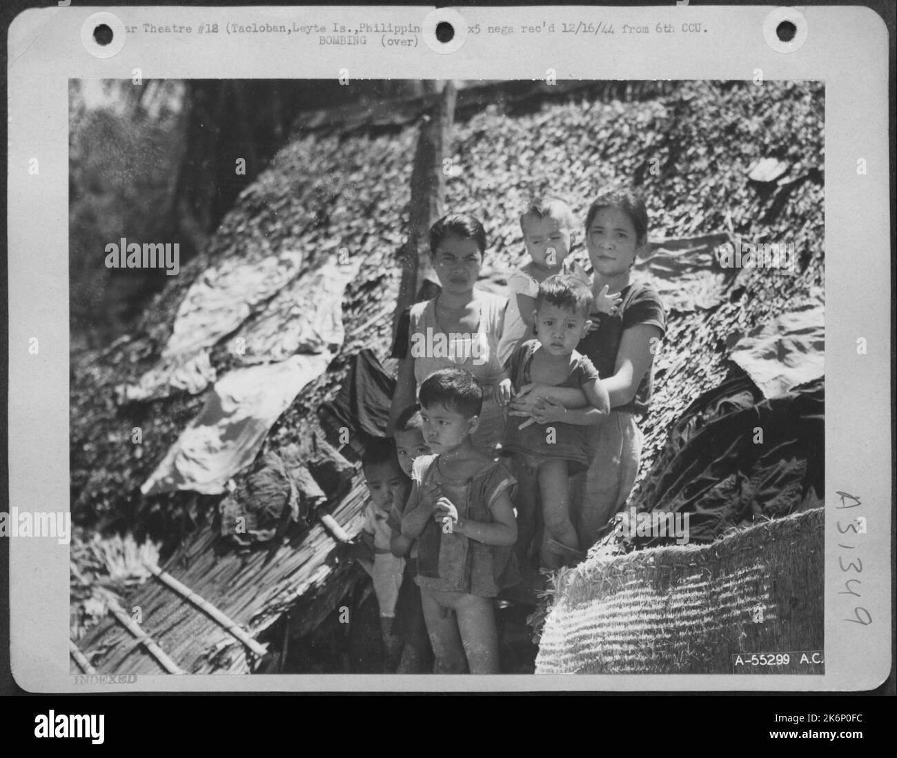 Bombed out by Japanese bombs and shells, this Filipino family from ...