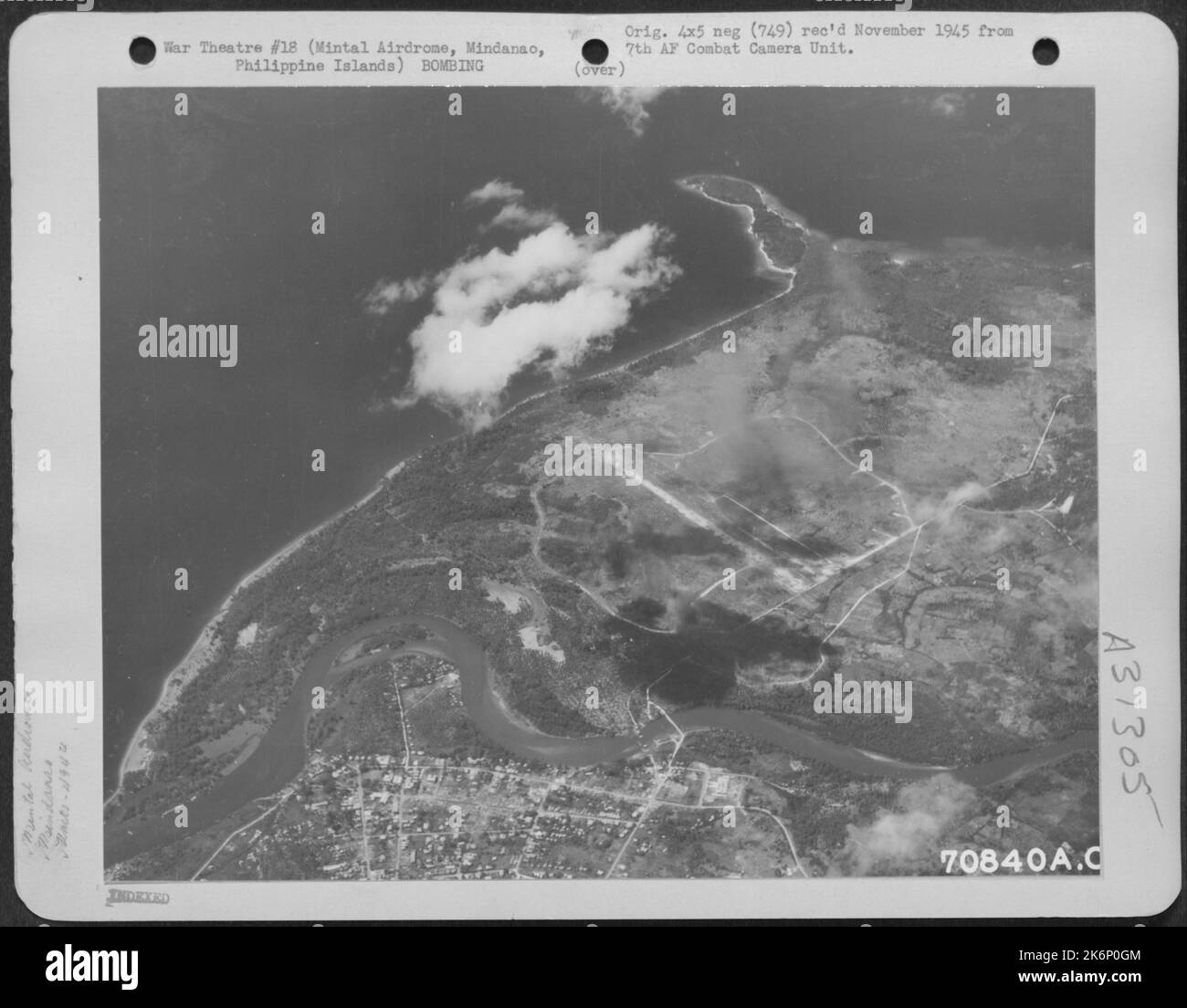 Bombs, dropped by Consolidated B-24's of the 494th Bomb Group, burst on ...