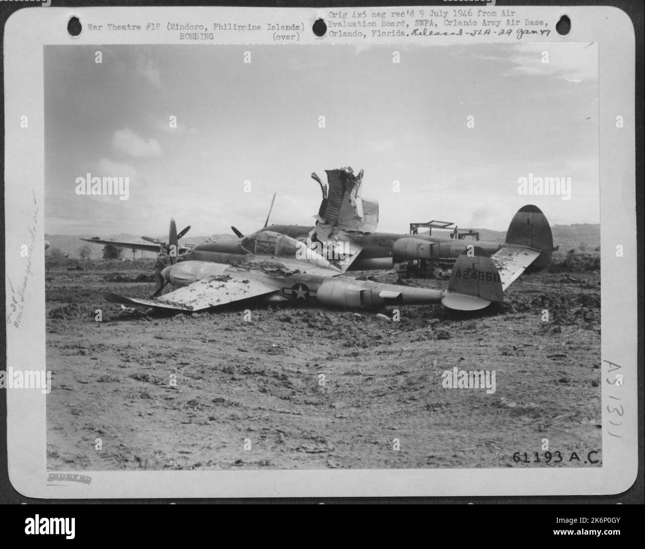 This damaged Lockheed P-38 "Lightning" was only 30 feet away from a ...