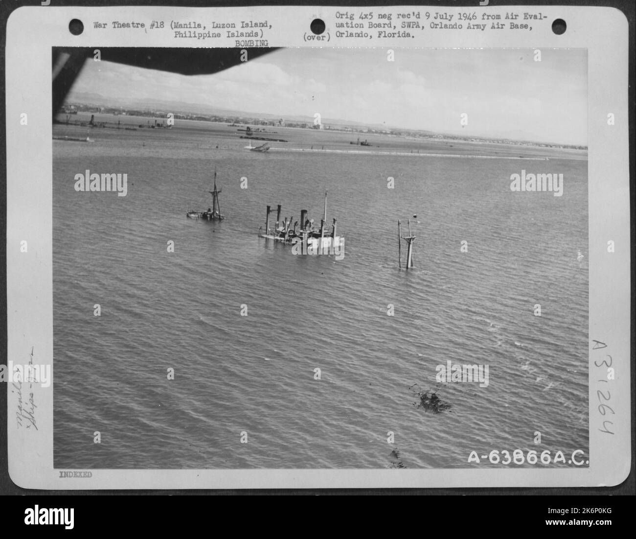 A 5500 g.t. (gross tonnage) Japanese freighter sunk in Manila Harbor ...