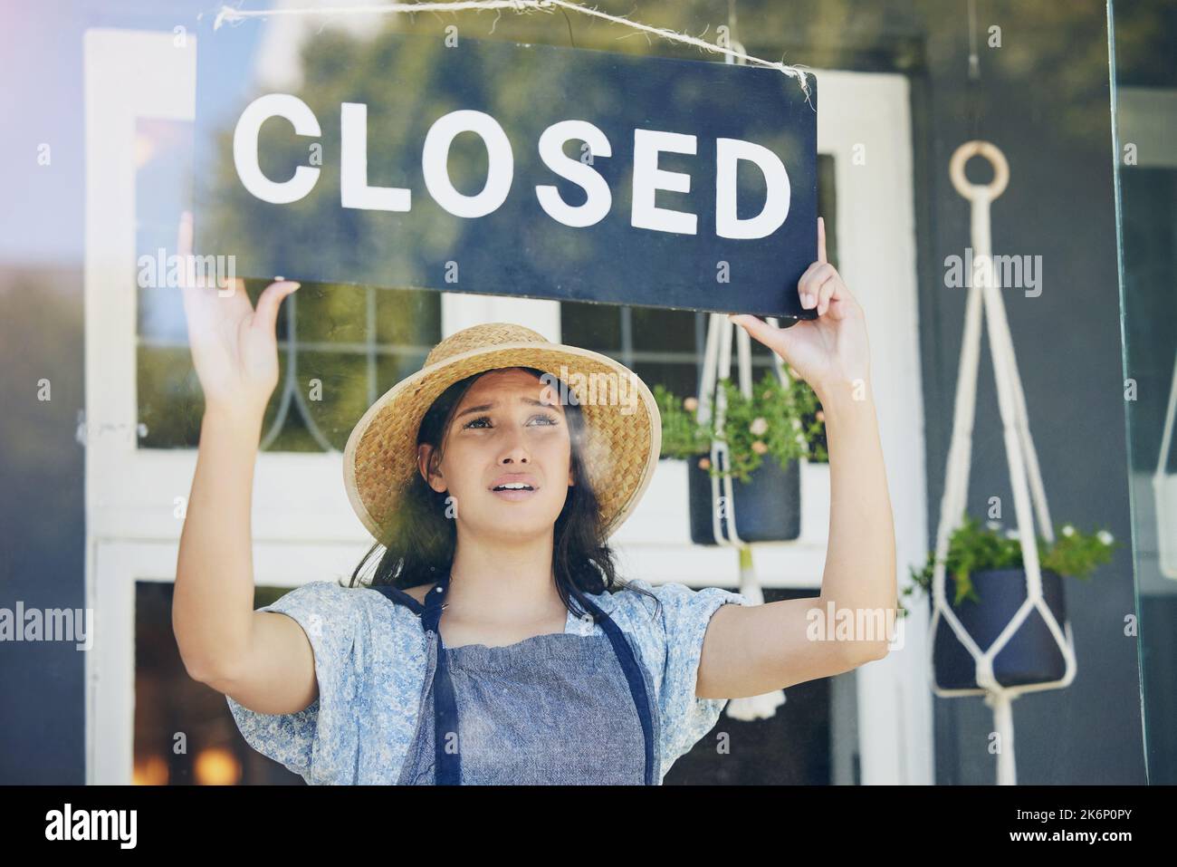 Florist woman unhappy hi-res stock photography and images - Alamy