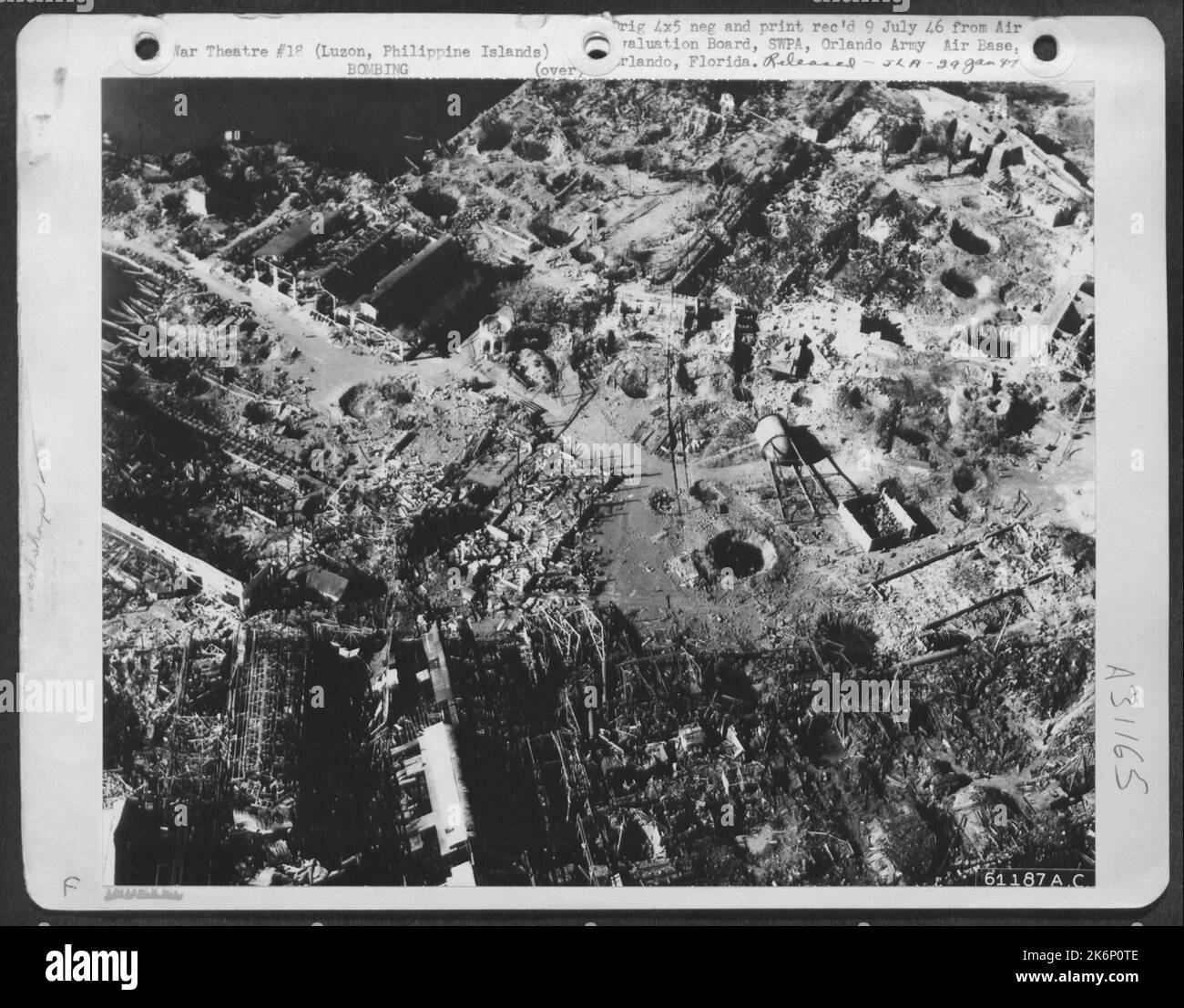 Bomb damage to workshops, Marine railways and warehouses in Cavite ...