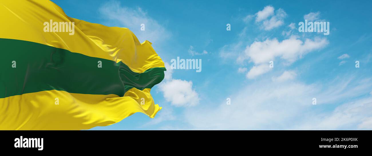 official flag of Isabela untied states of America at cloudy sky ...