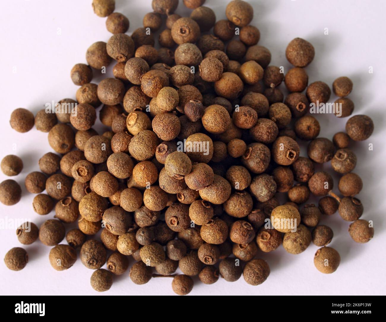 aromatic allspice on a white background Stock Photo - Alamy