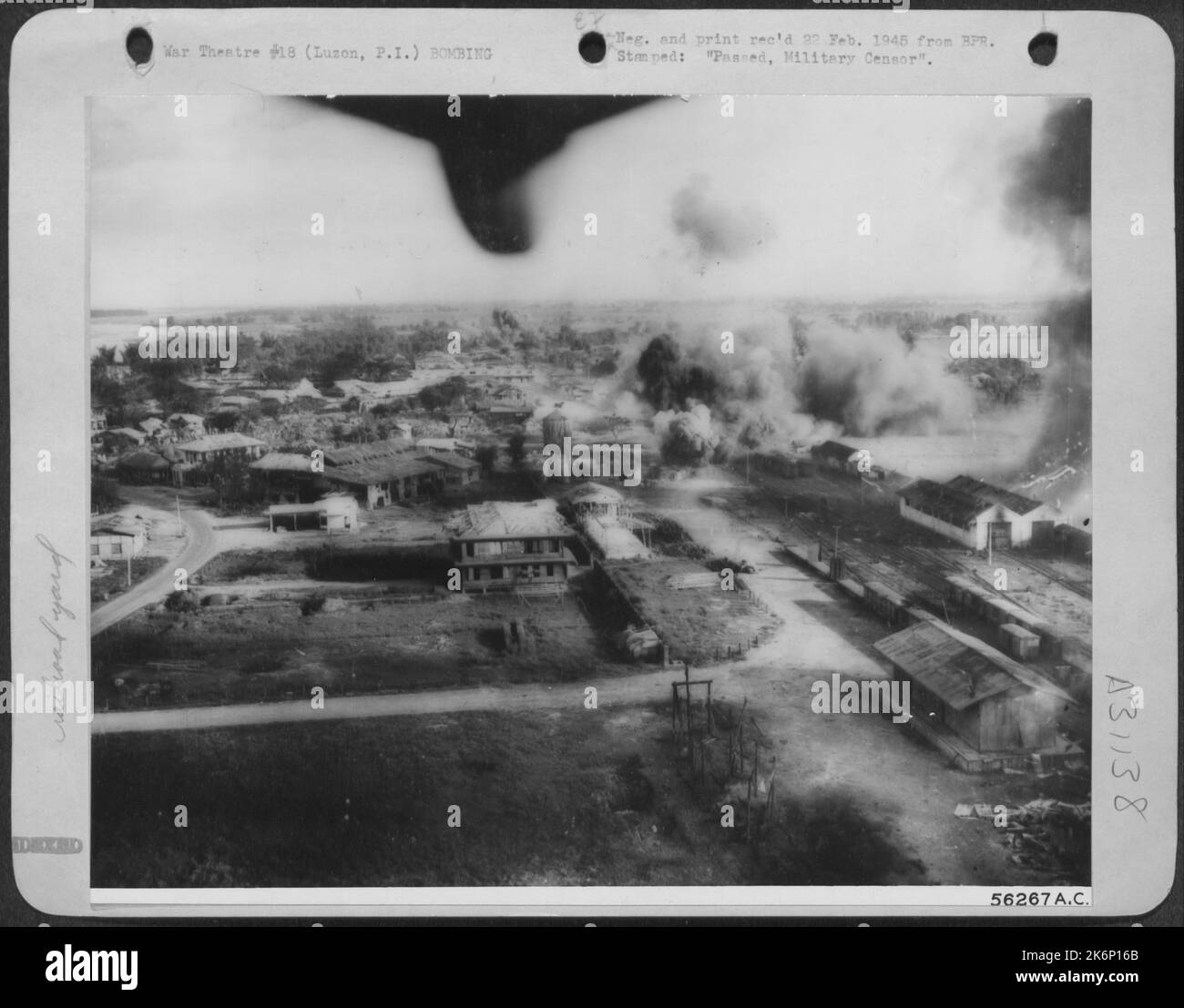 A Jap-held rail center in southeastern Luzon under attack by U.S. Fifth ...