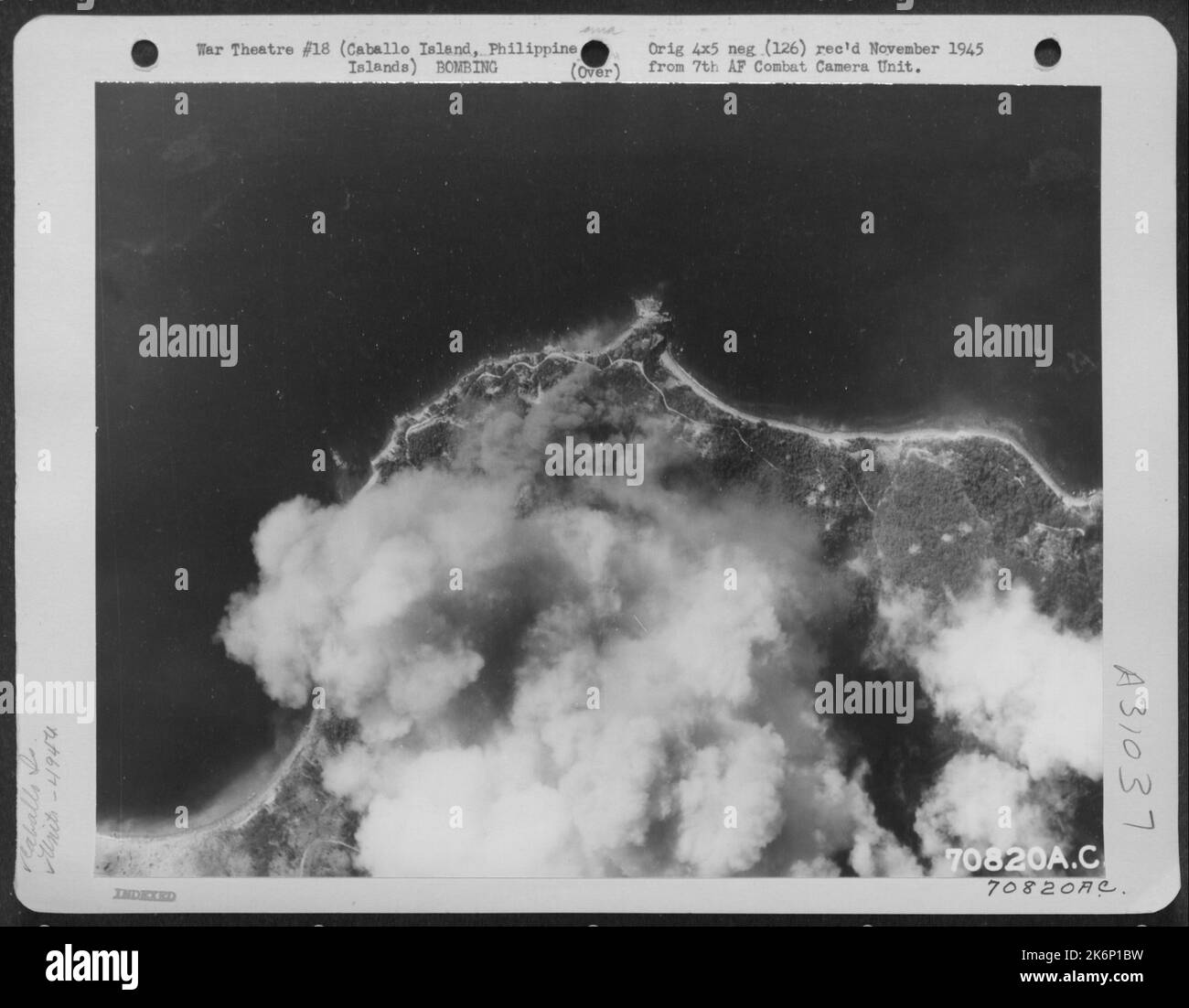 Bombs, dropped by Consolidated B-24s of the 494th Bomb Group, burst on ...