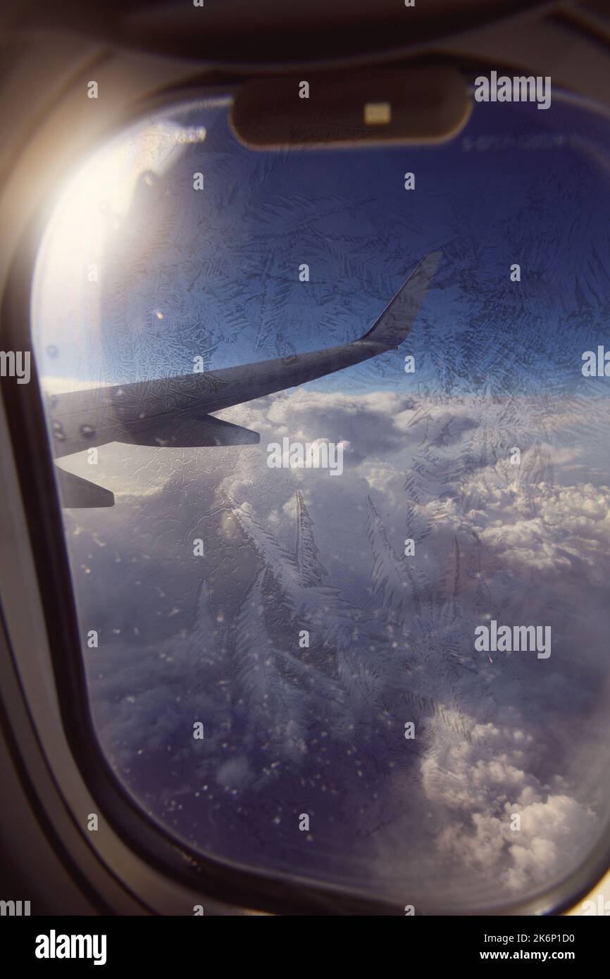 Frosted window of a passenger plane Stock Photo - Alamy