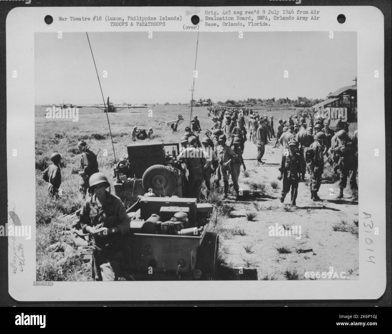 Men of the 11th Airborne Division assemble at a pre-destined point ...