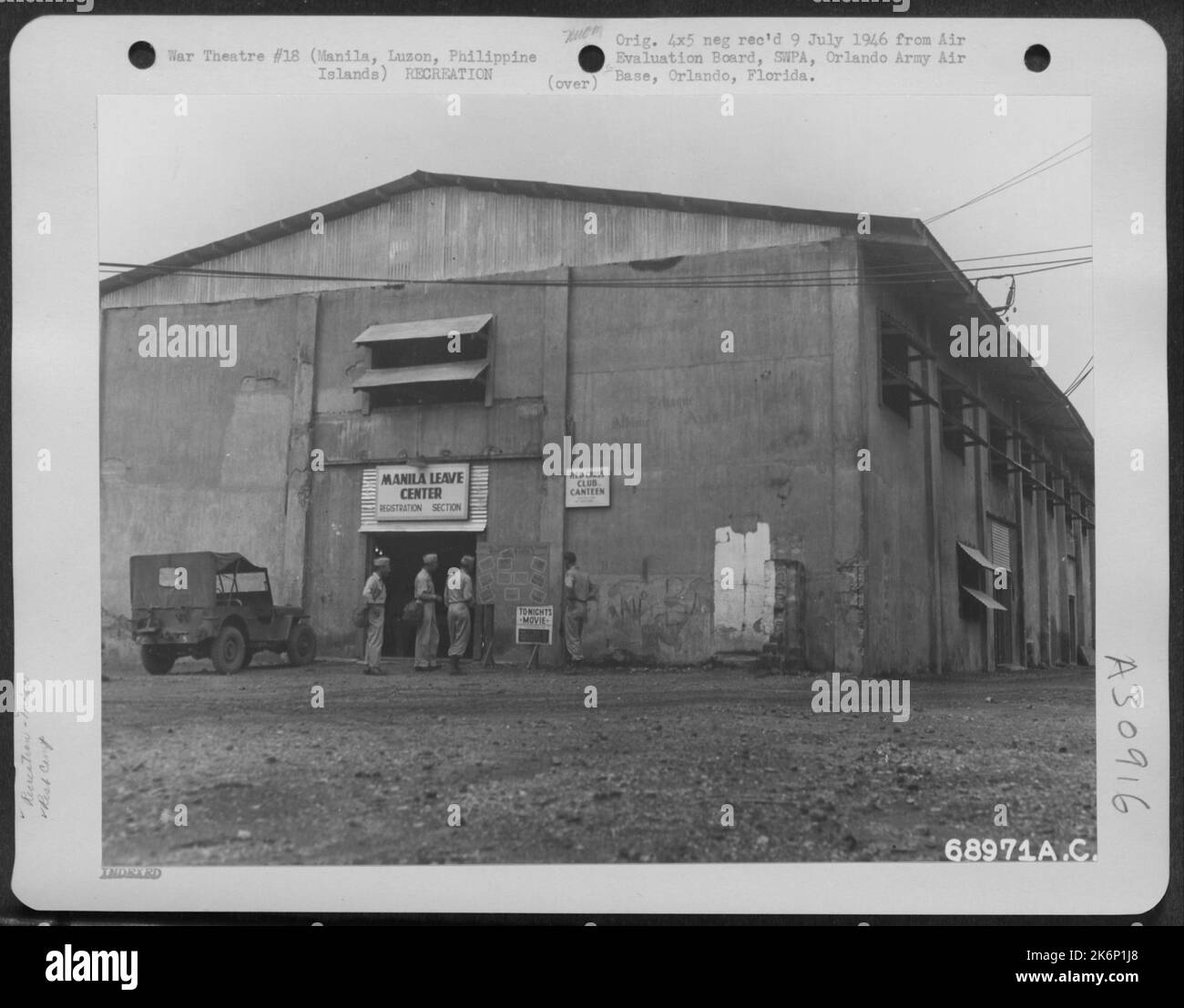 Enlisted personnel who are arriving at the registration building of the ...