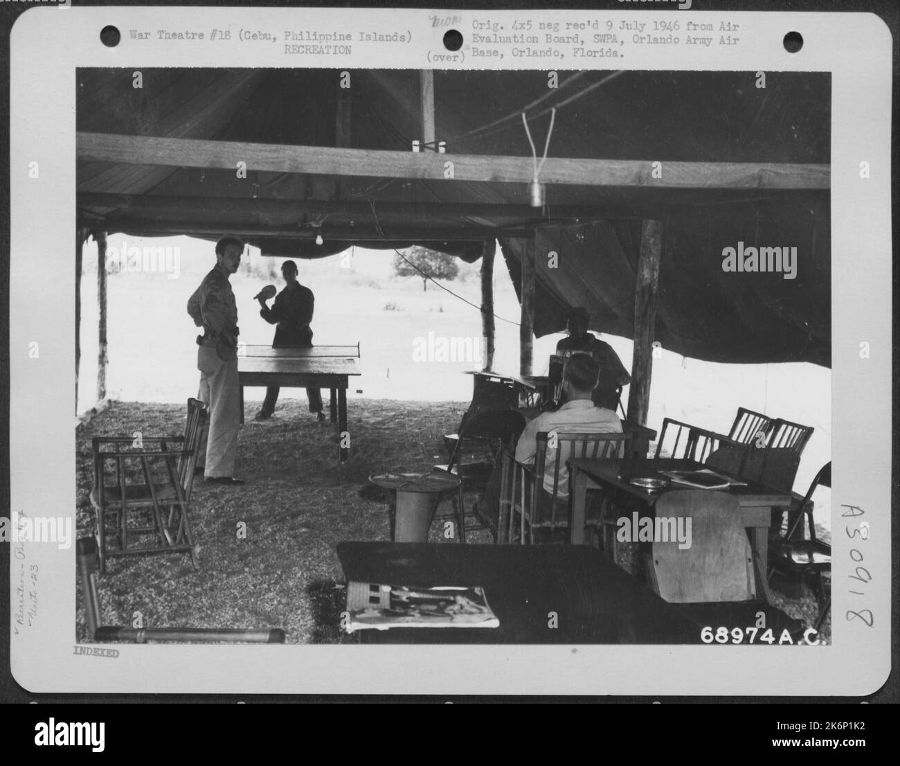 A game of ping pong is in progress at the Red Cross Recreational Center ...