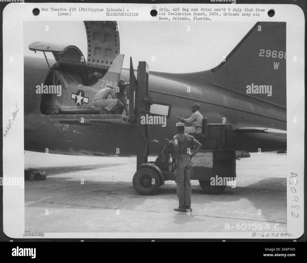A fork lift truck and pallet used for Vultee L-5 from a C-46 "Commando ...