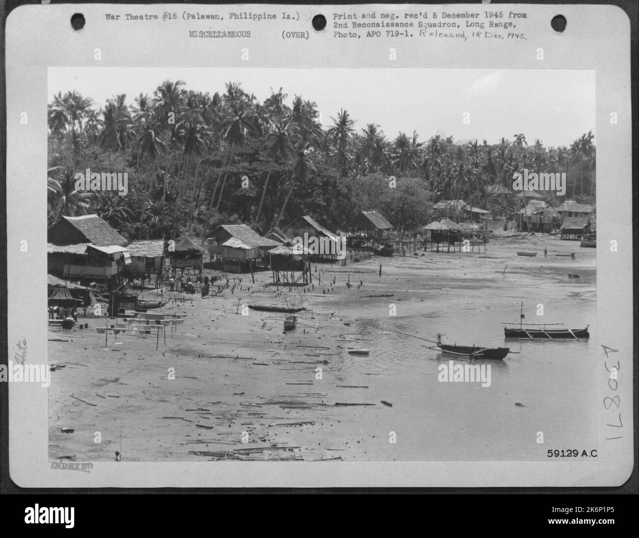 Native huts along coast at Palawan, Philippine Islands. 9 October 1945 ...
