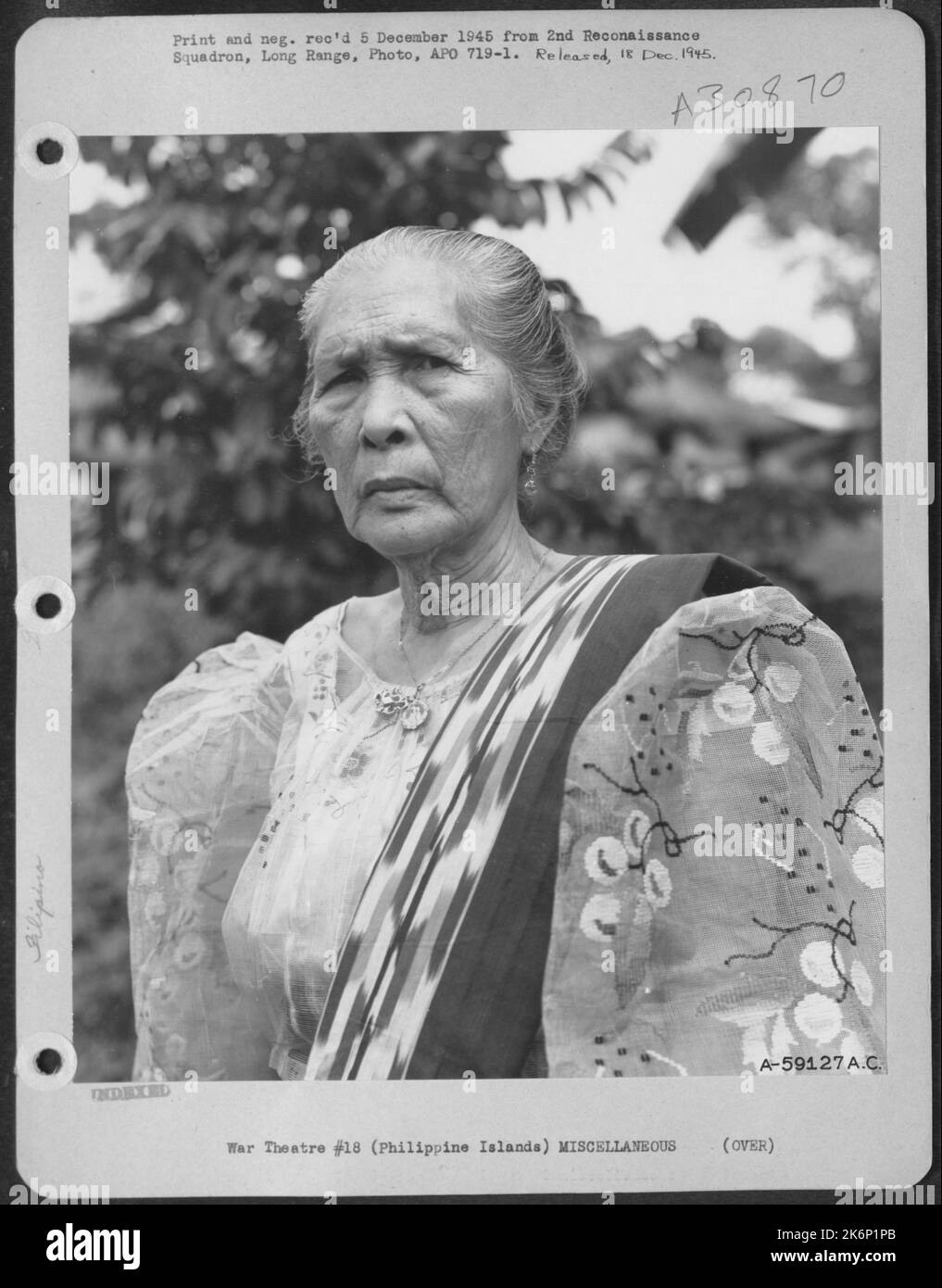 An old Filipino woman wearing the native Balintawack dress. 7 October ...