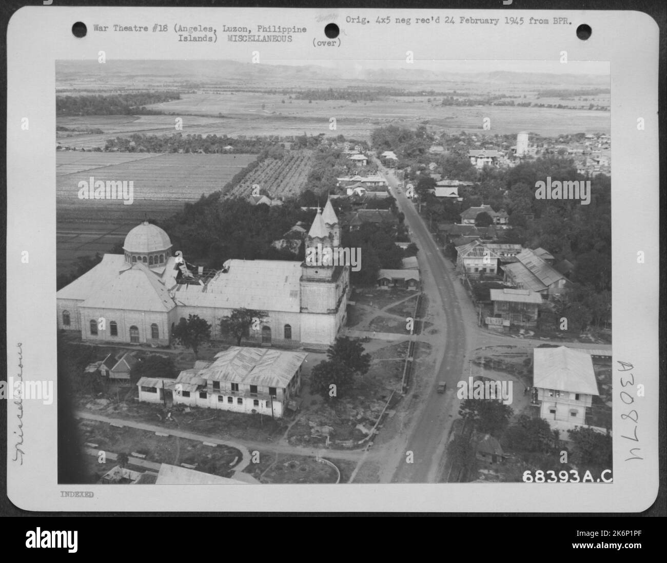 After hitting the spire of the cathedral at Angeles, Luzon, Philippine ...