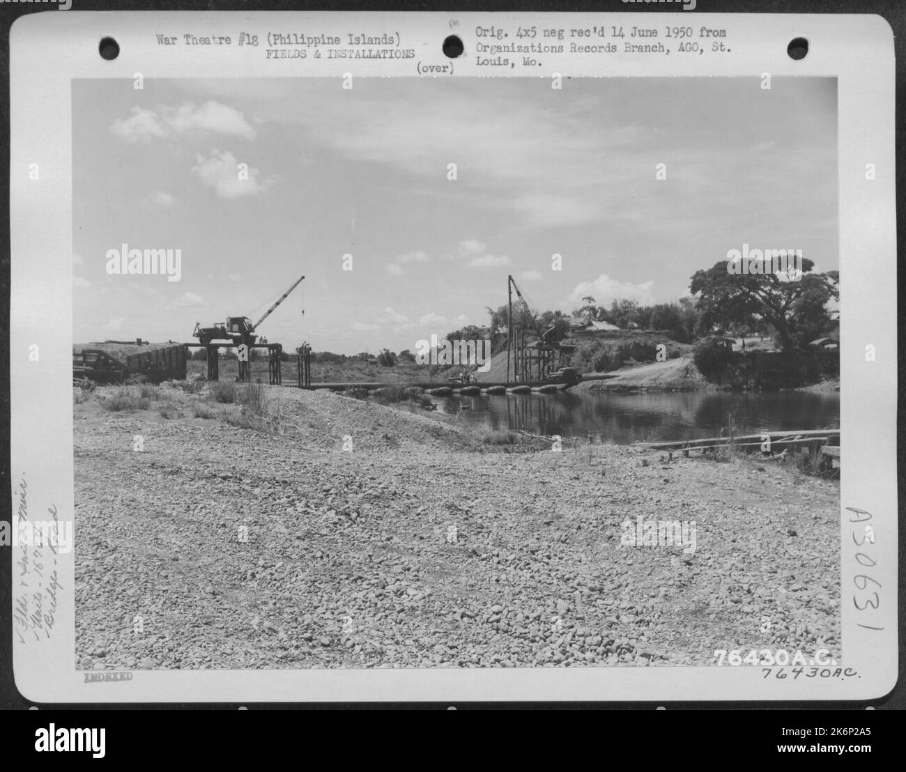 Personnel of "A" Co., 1876 Eng. Aviation Battalion rebuild a badly ...