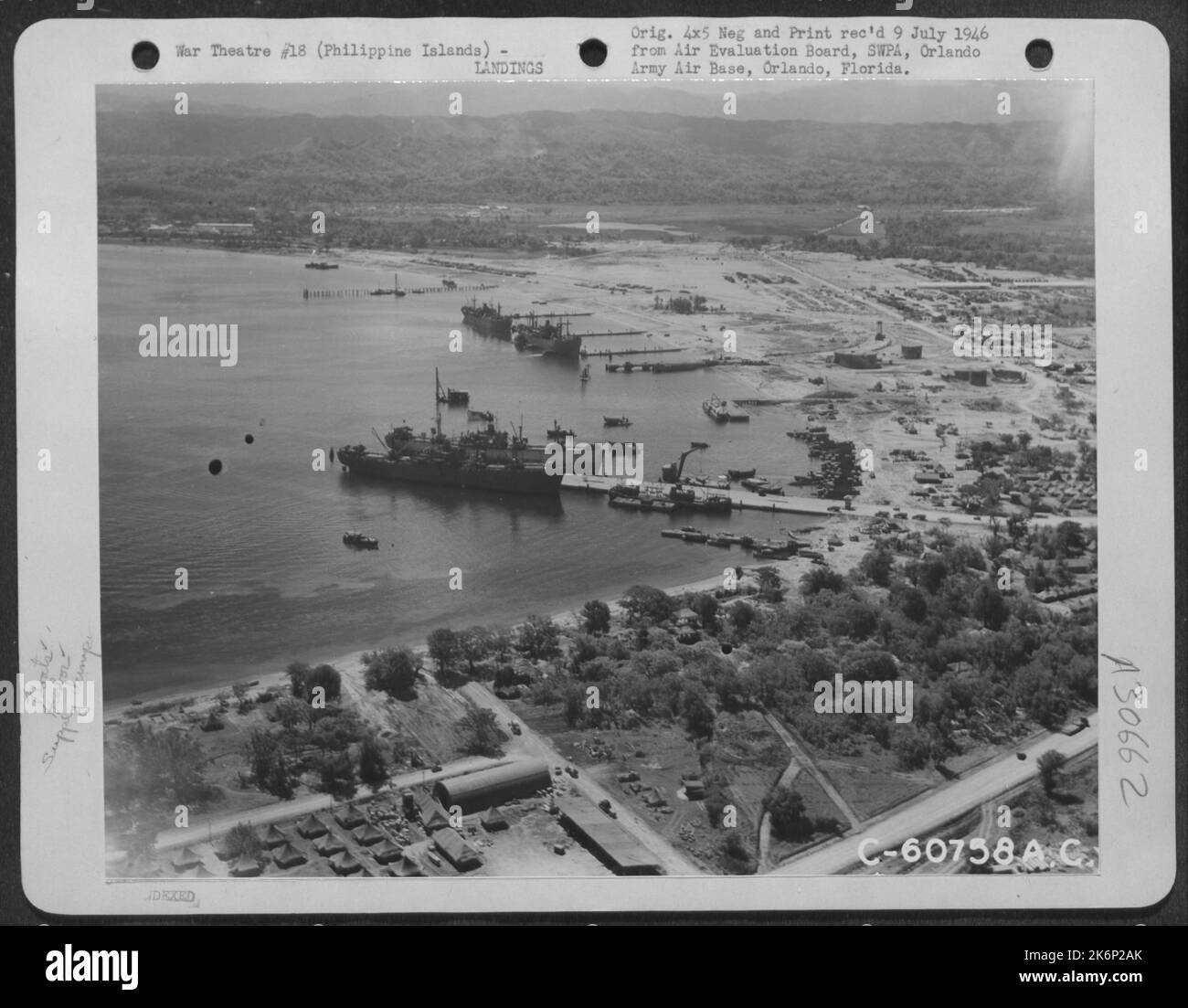 Ships unloading at San Fernando Point in the Philippine Islands. Larg ...
