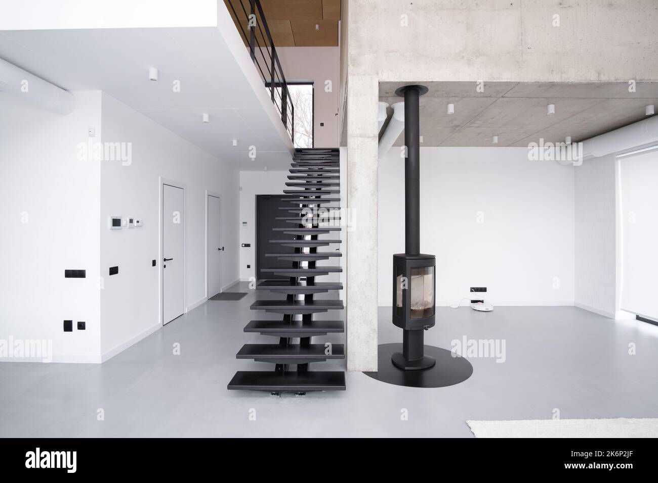 Photo of a modern interior of a luxury home. High-tech ceiling design ...