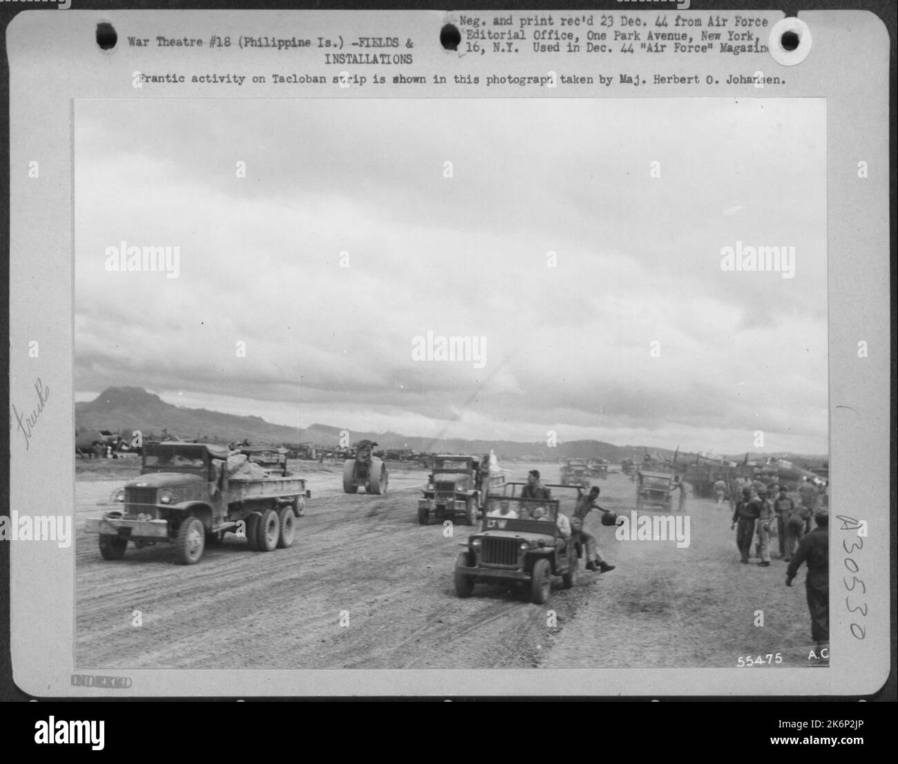 Frantic activity on Tacloban strip is shown in this photograph taken by ...