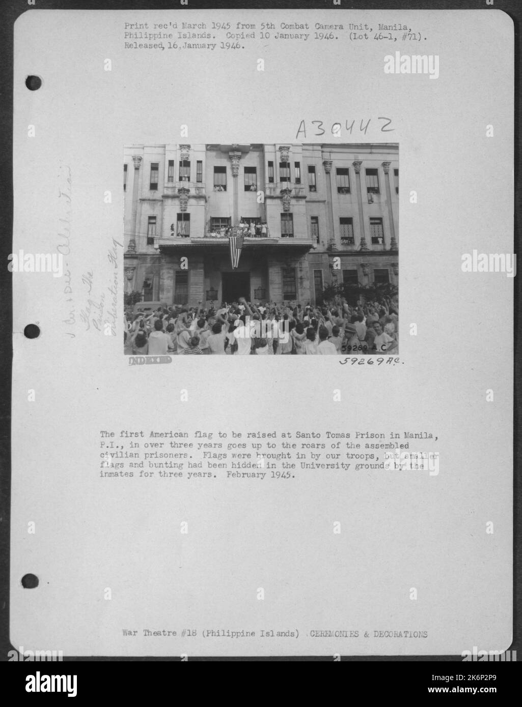 The first American flag to be raised at Santo Tomas Prison in Manila, P ...