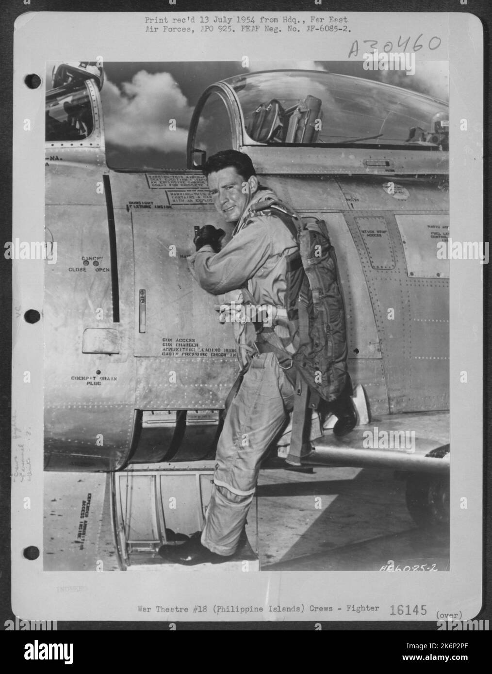 HQ. FEAF, TOKYA--Major Jack S. Wilson Climbs aboard his U.S. Air Force ...