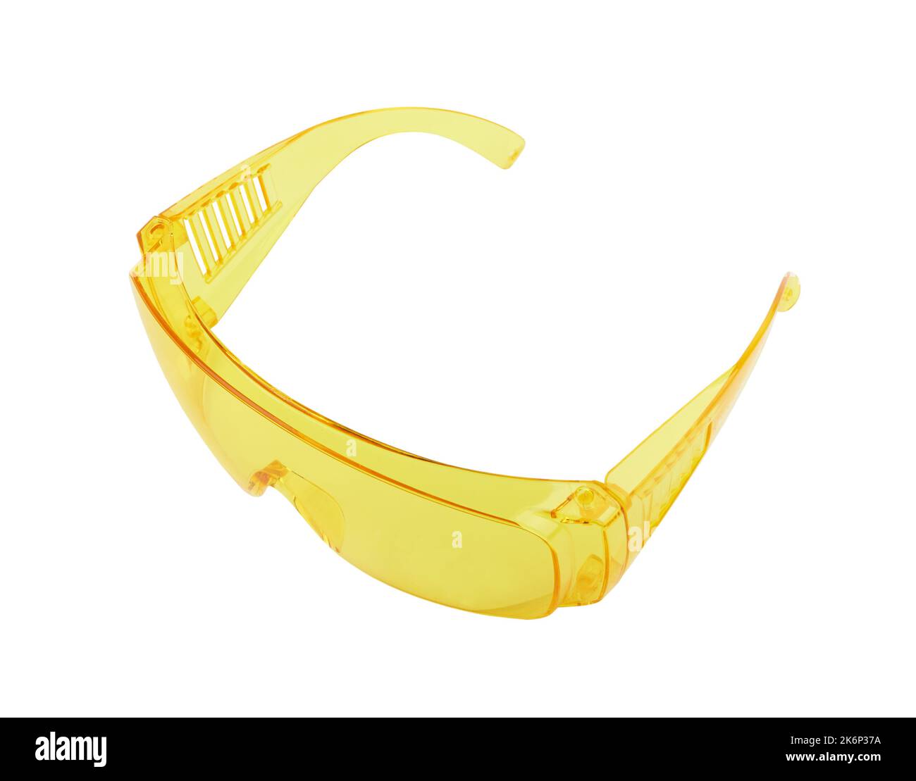 Yellow plastic protective work glasses isolated on a white background ...