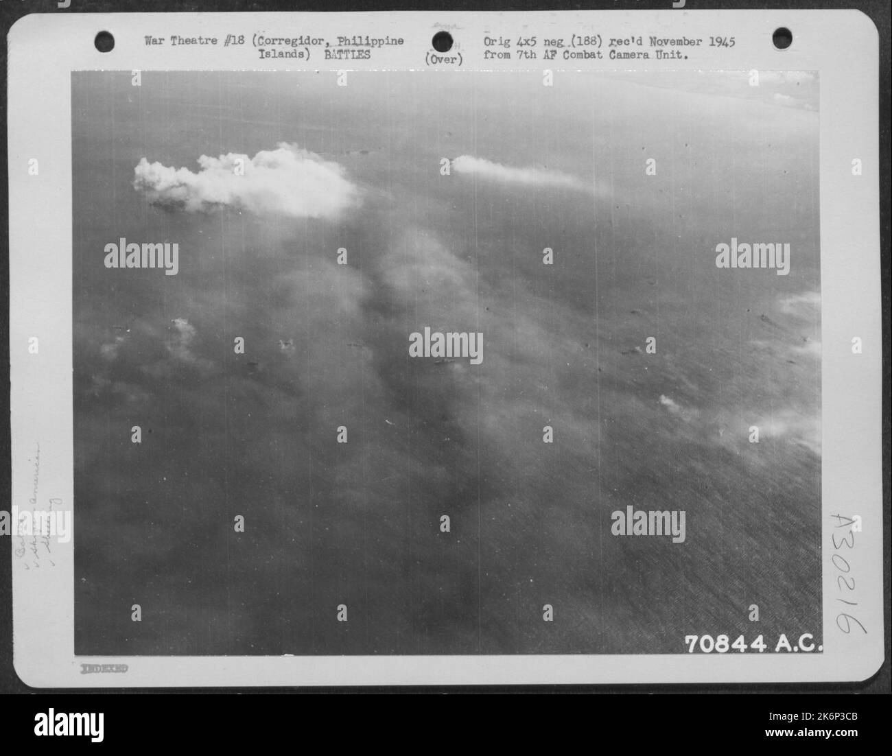 Shells from the Navy battleships burst on targets at Corregidor and ...