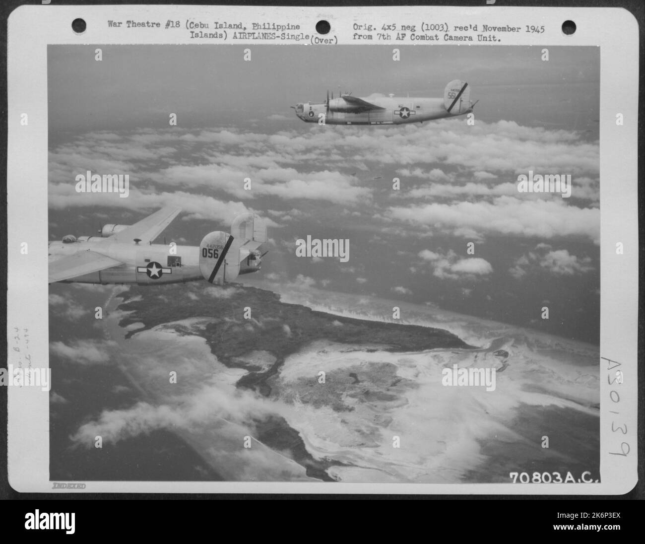 Consolidated B-24 "Liberators" of the 494th Bomb Group, approach the ...