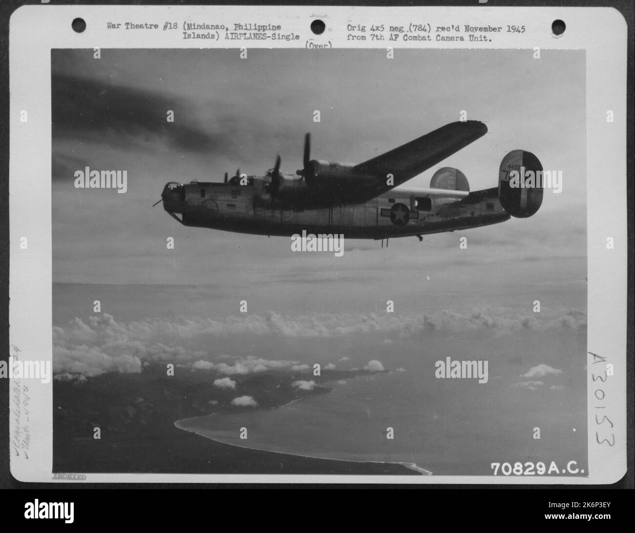 A Consolidated B-24 "Liberator" of the 494th Bomb Group flies high ...