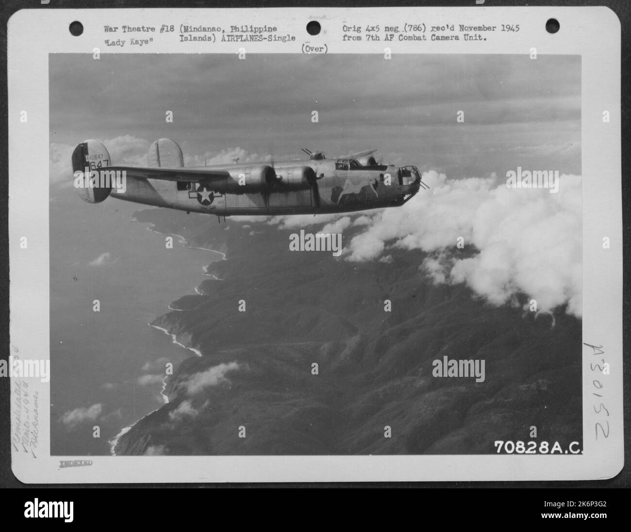 The Consolidated B-24 "Lady Kaye" of the 494th Bomb Group flies high ...