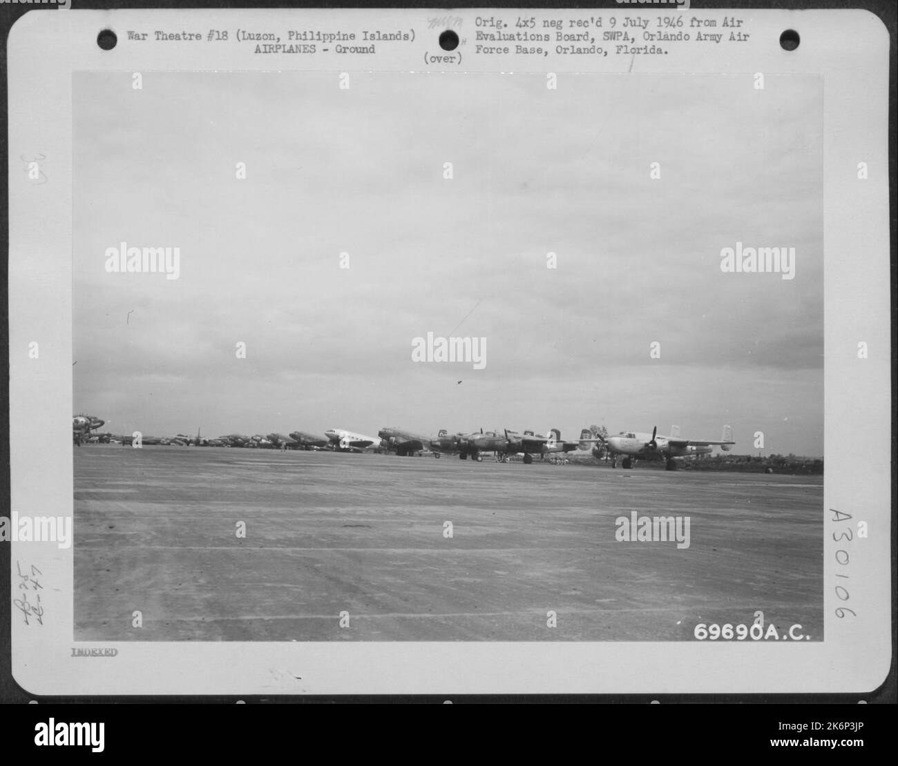 Transient aircraft-North American B-25s and Douglas C-47s-are lined up ...