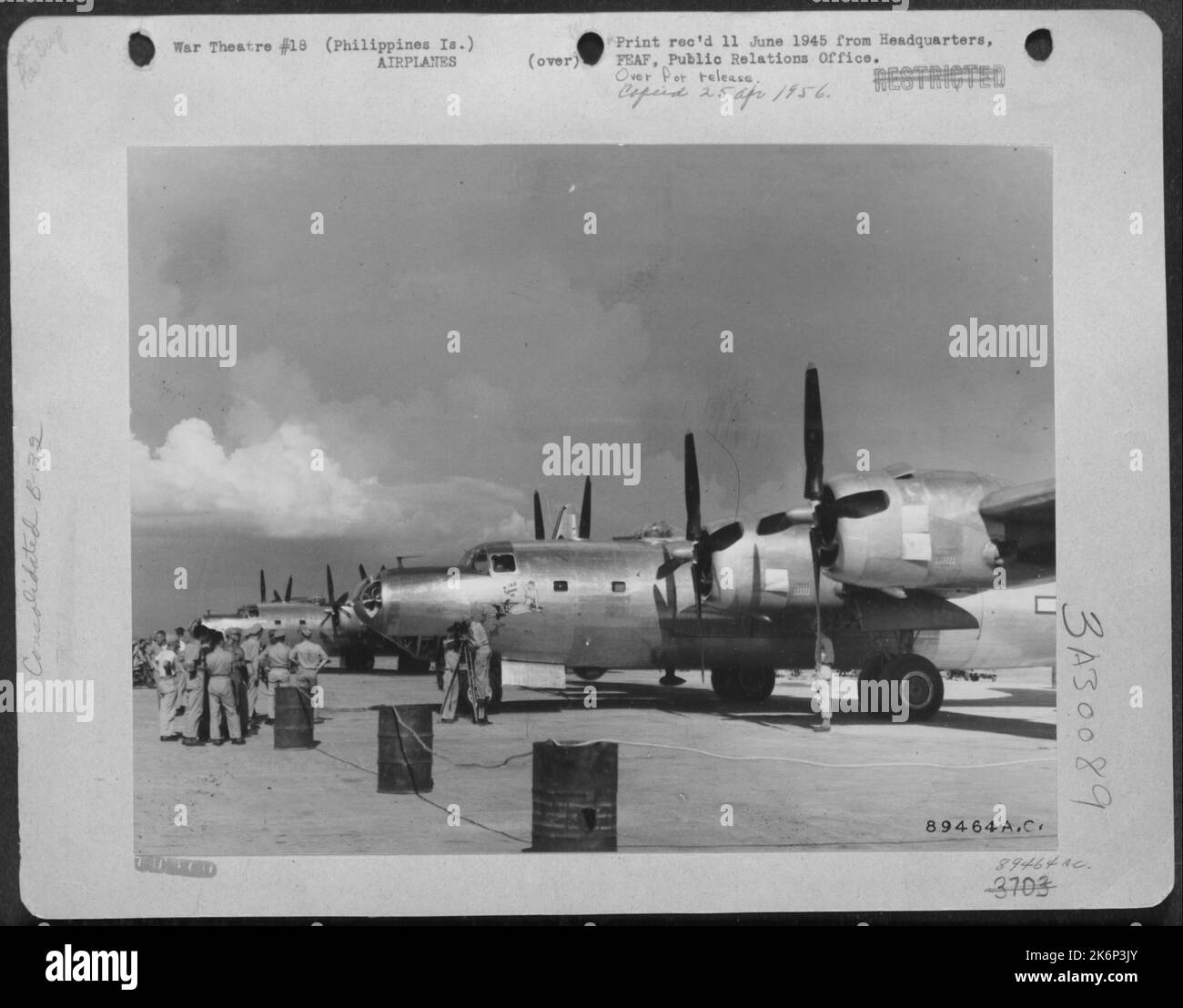 PHILIPPINES-Curious fliers and ground crews of the 5th AF gather around ...