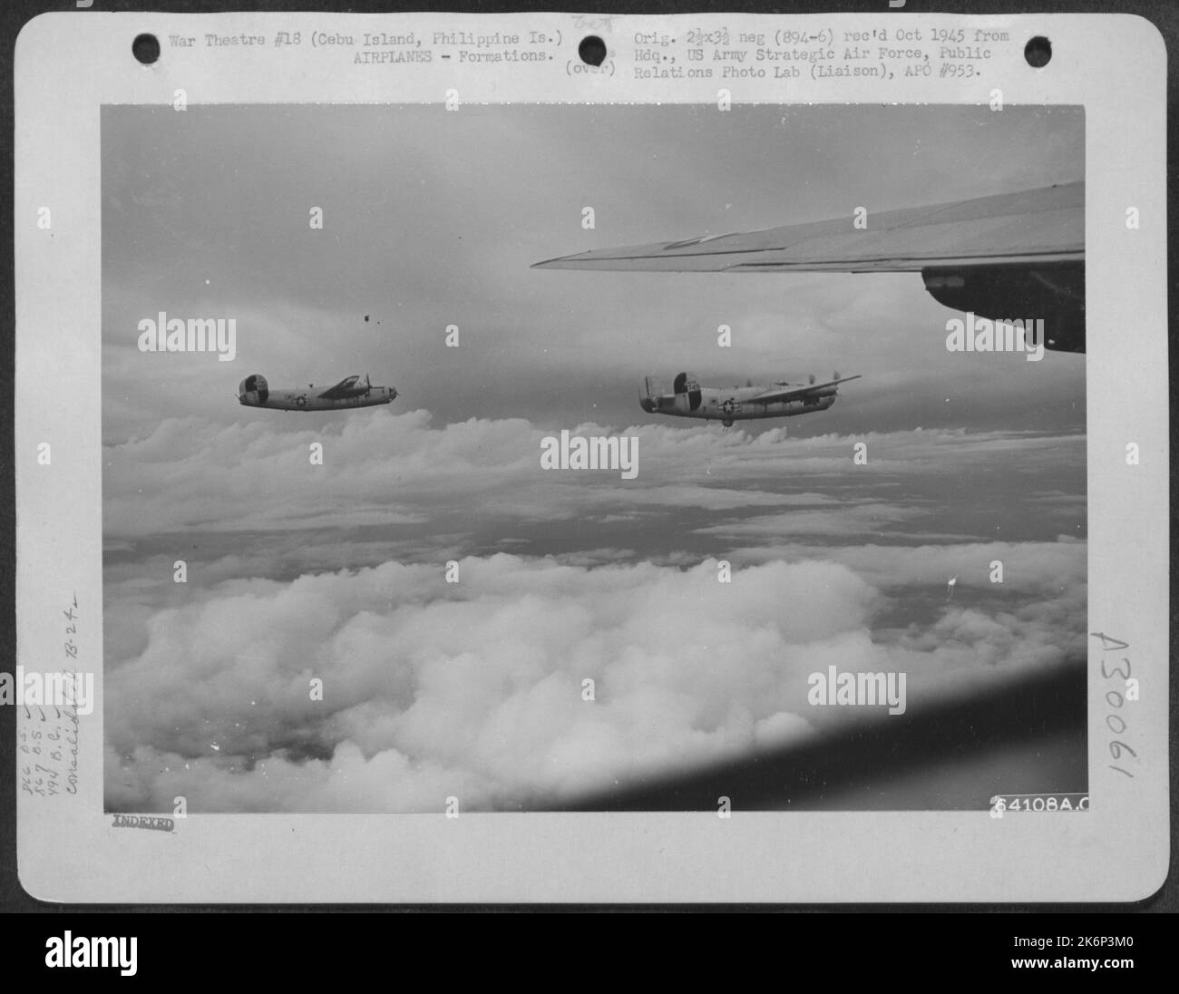 Two Consolidated B-24 Liberators, part of a formation of the 866th and ...