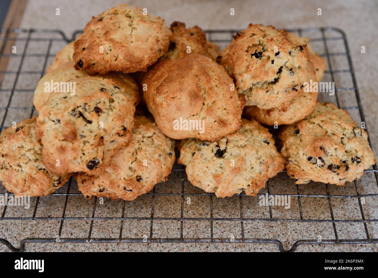 Rock Cakes cooling on wire tray in kitchen Hook Norton Oxfordshire ...