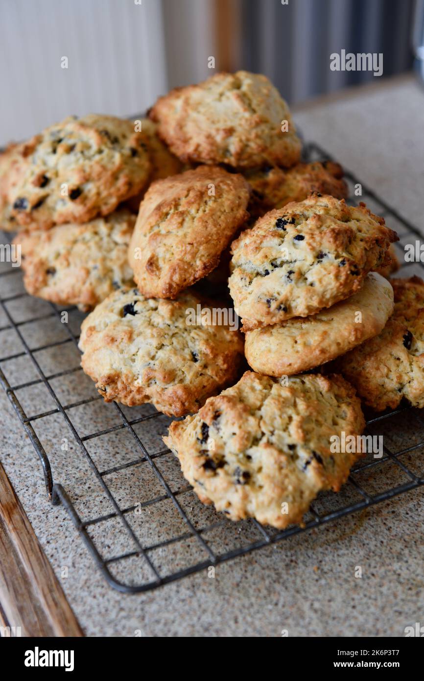 Rock Cakes cooling on wire tray in kitchen Hook Norton Oxfordshire ...