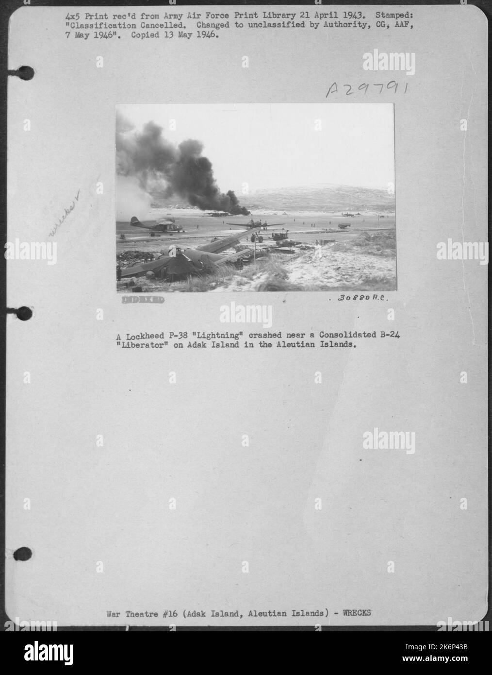 A Lockheed P-38 "Lightning" crashed near a Consolidated B-24 "Liberator ...