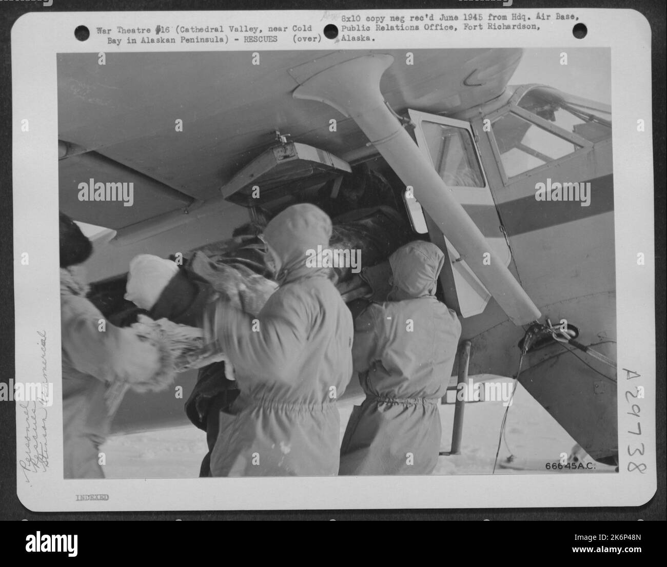 The injured pilot, Lt. Joseph R. Alexander, of the wrecked Douglas C-47 ...