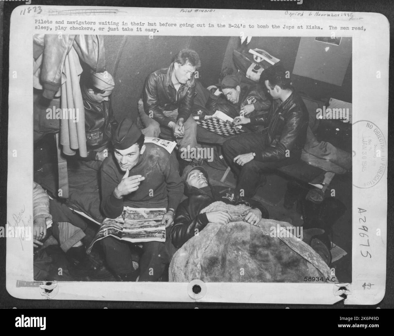 Pilots and navigators waiting in their hut before going out in the B-24 ...