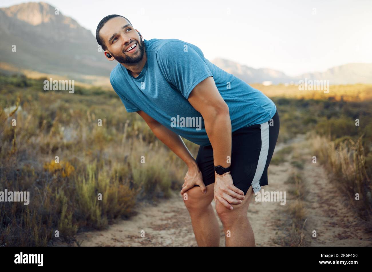 Running, fitness and man thinking in nature while training in ...